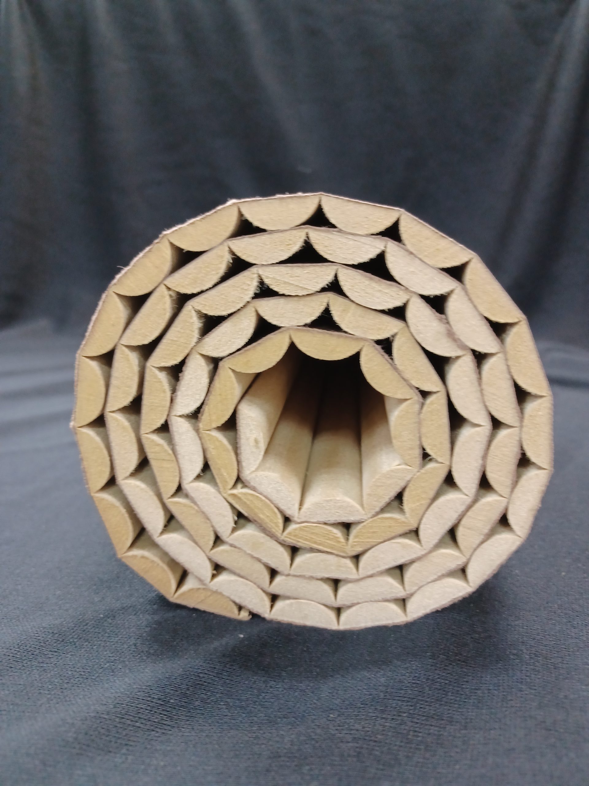 Flexible fluted wood panel boards, pole wrap, wood covers | Carol Young